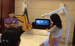 Personal Arm-Mounted healthcare TVs